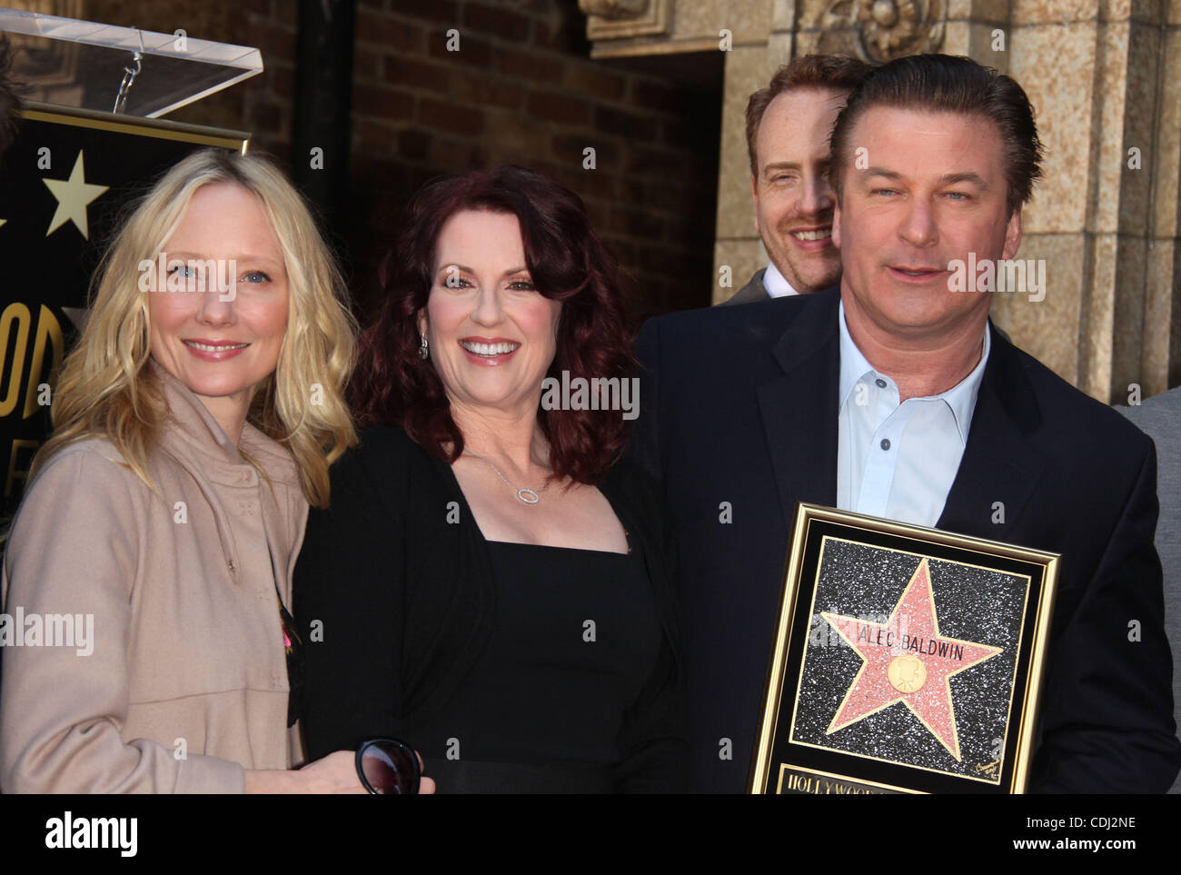 Alec baldwin and megan mullally hi-res stock photography and images - Alamy