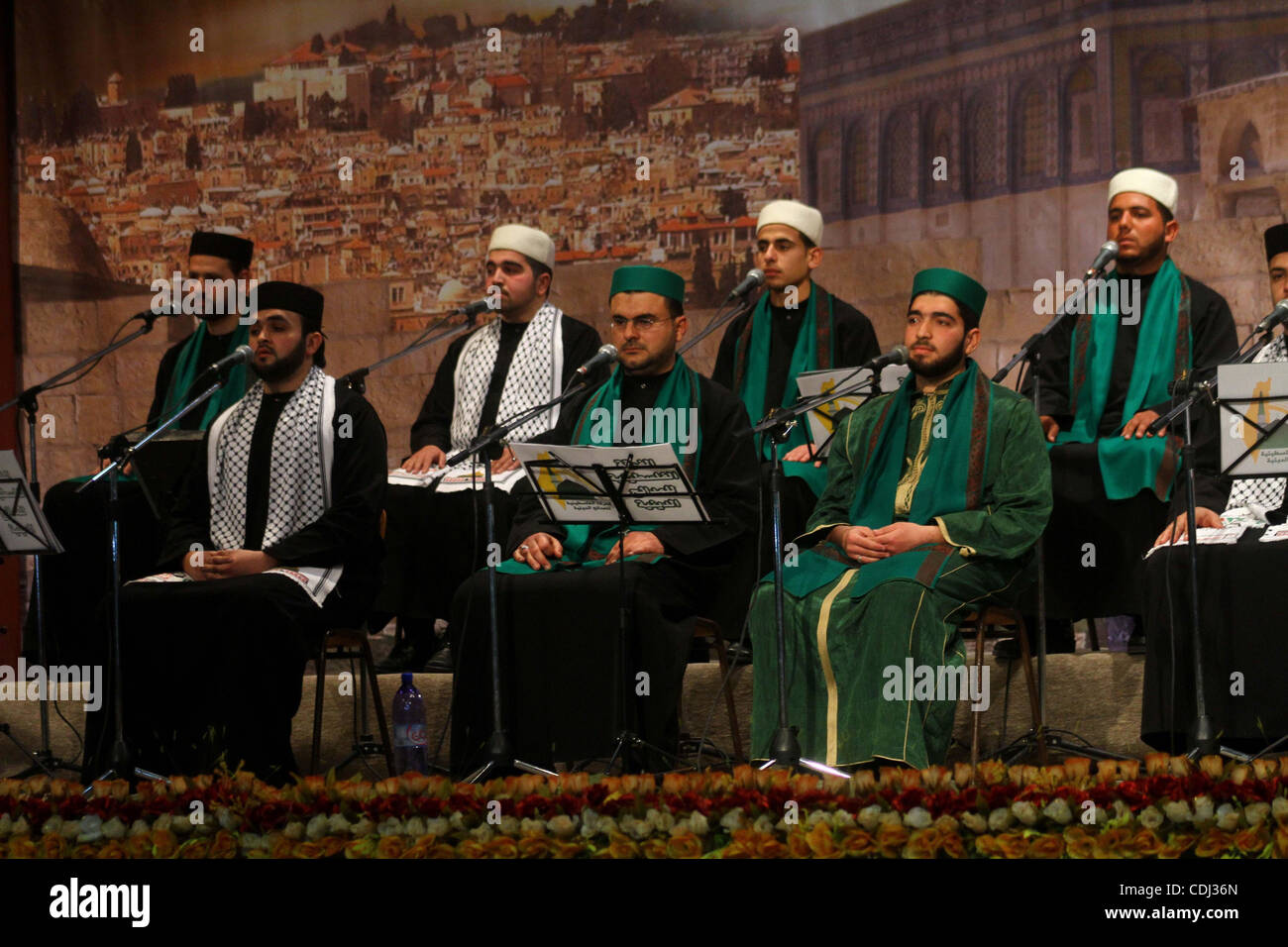 Palestinian youths sing Islamic songs during a ceremony commemorating ...