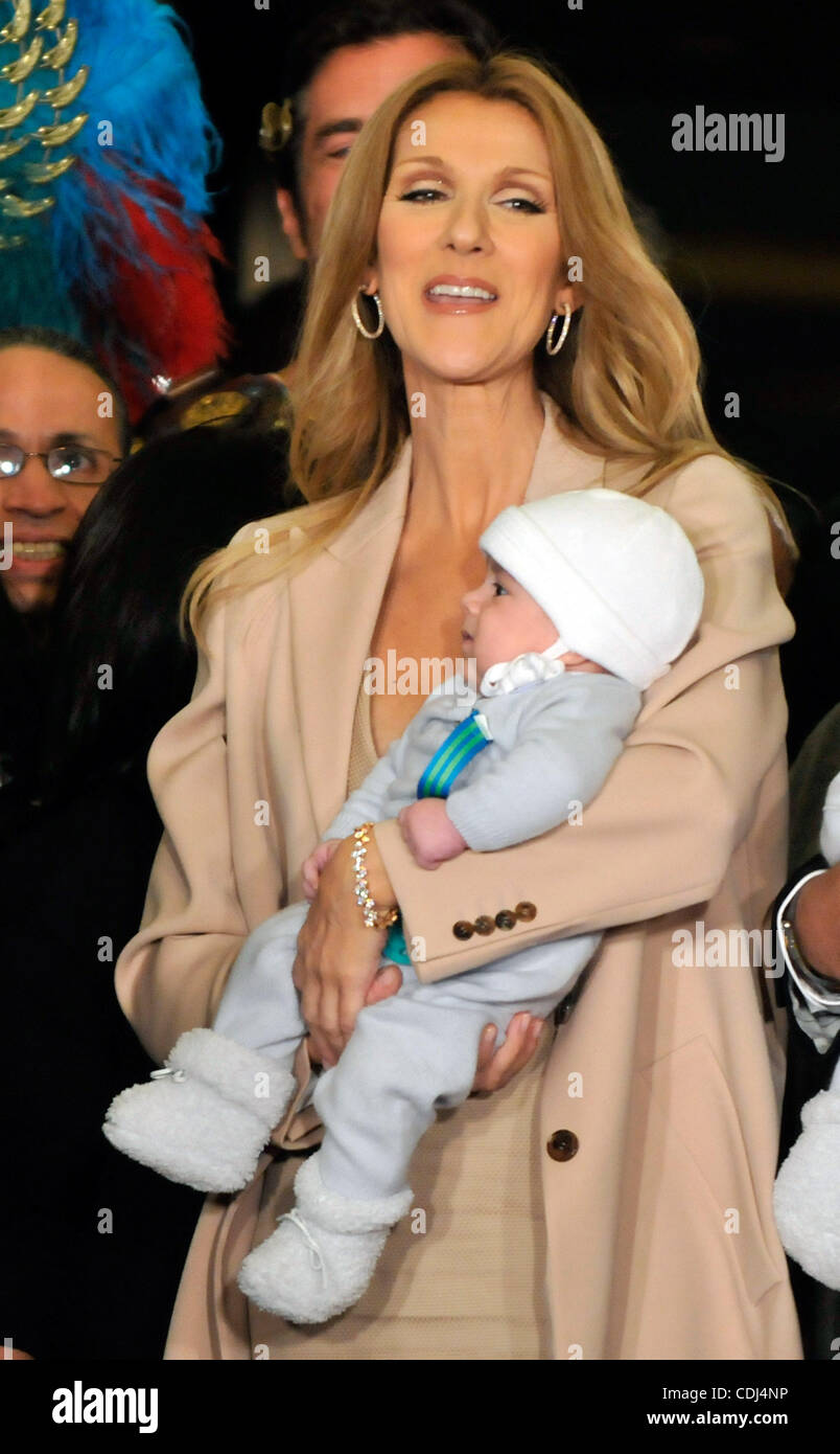 Feb. 16, 2011 - Las Vegas, Nevada, USA - Singer CELINE DION, holding ...