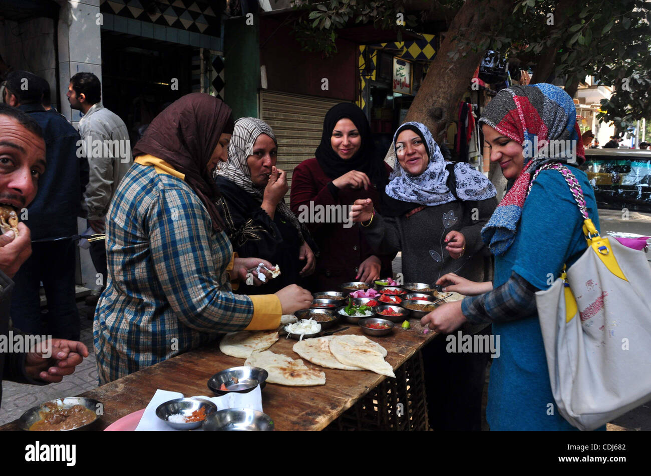 Egyptian people participate in their daily life in Cairo, Egypt on Feb ...