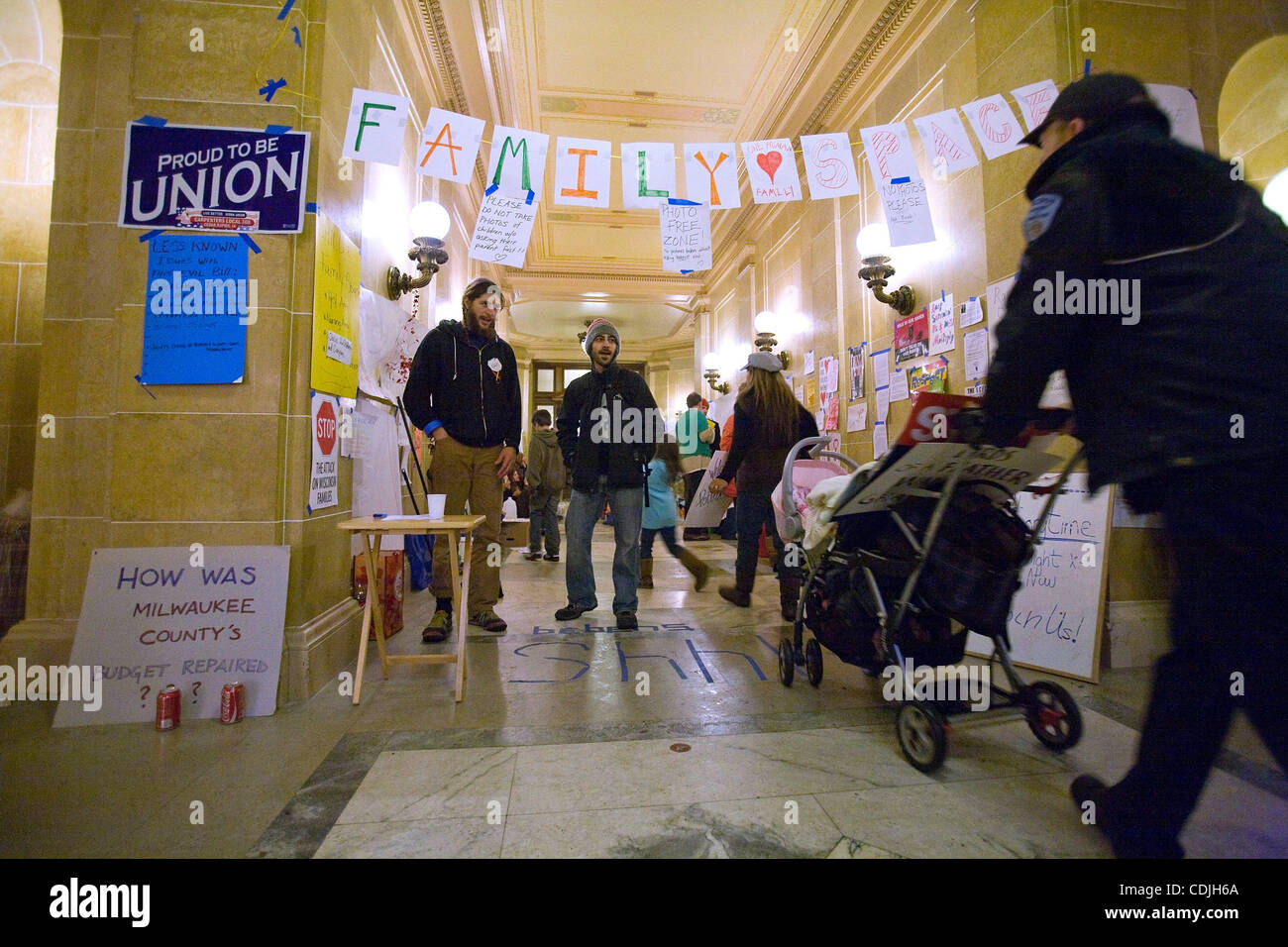 Feb 26, 2011 - Madison, Wisconsin, U.S. - A protester wheels a stroller ...