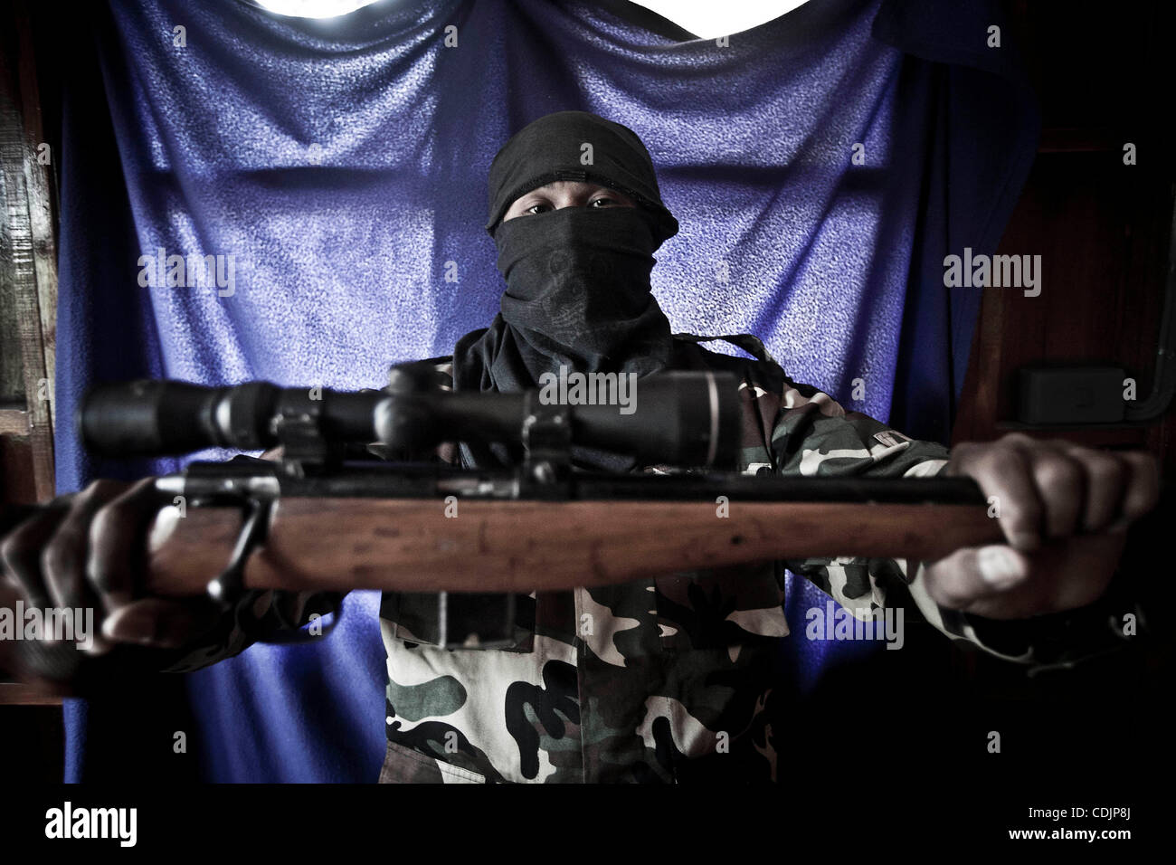 March 1, 2011 - Mae Sot, Tak, Thailand - A guerrilla soldier from the ...