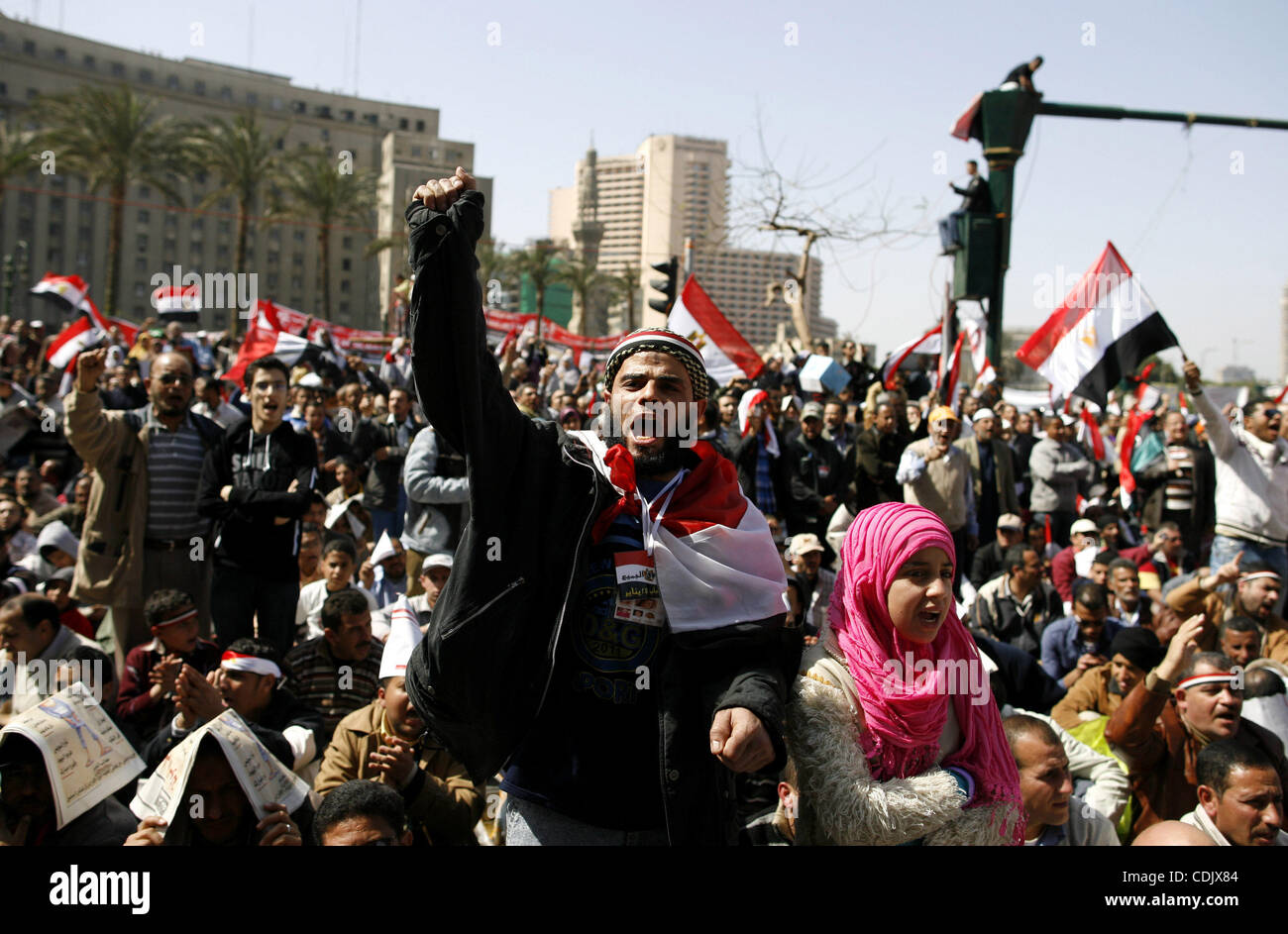Egyptian protesters attend the Friday demonstration at the Tahrir ...