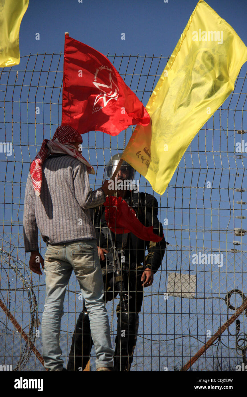 Palestinian demonstrators holds Palestinian flags during a ...