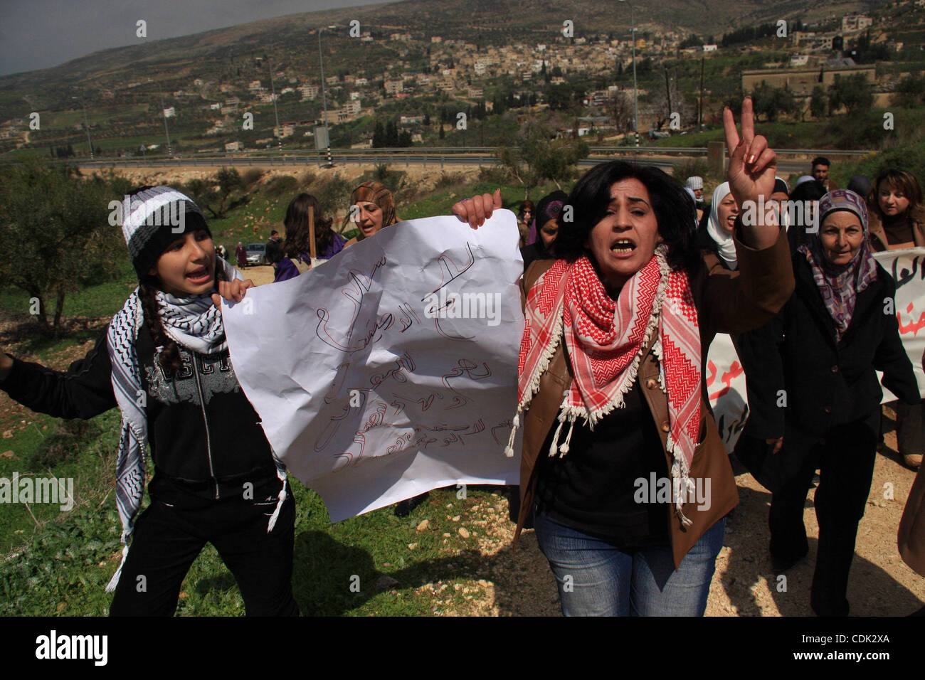 Palestinian women shout slogans during women's demonstration in the ...