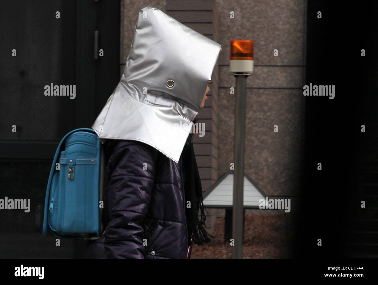 Mar. 11, 2011 - Tokyo, Japan - School children make their way home ...