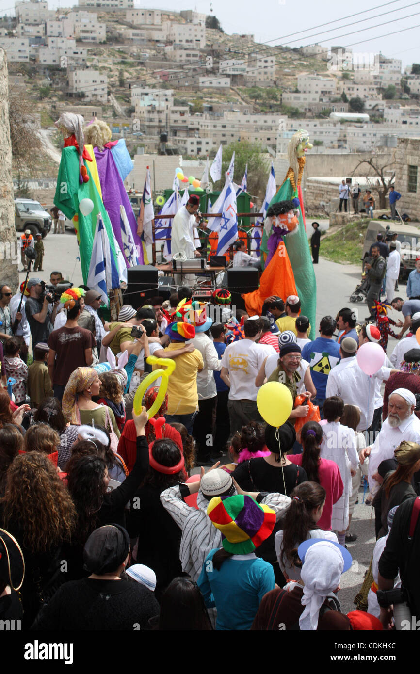 Israelis parade during their celebration of the Jewish holiday of Purim ...