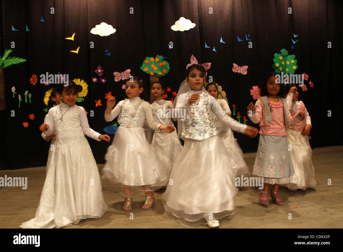 Palestinian children dance during an entertaining celebration organized ...