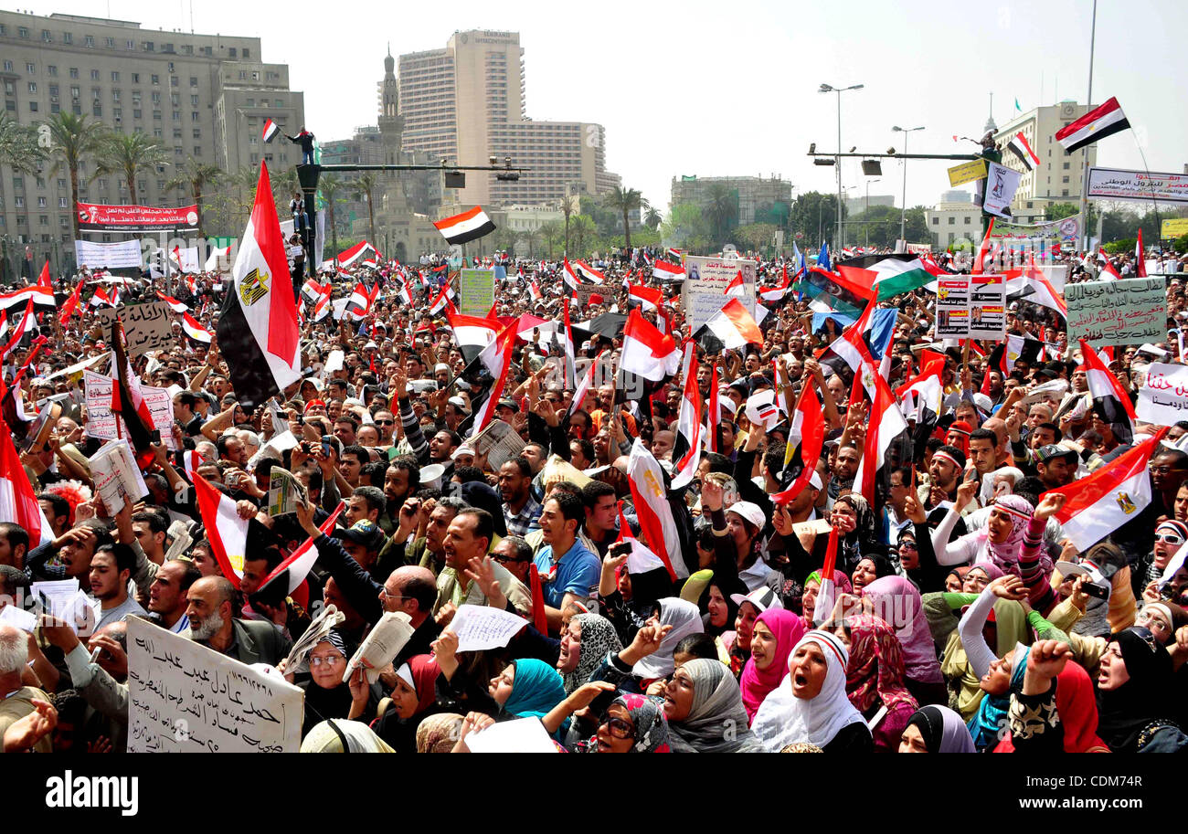 Egyptian protesters participate in a demonstration at the Tahrir square ...