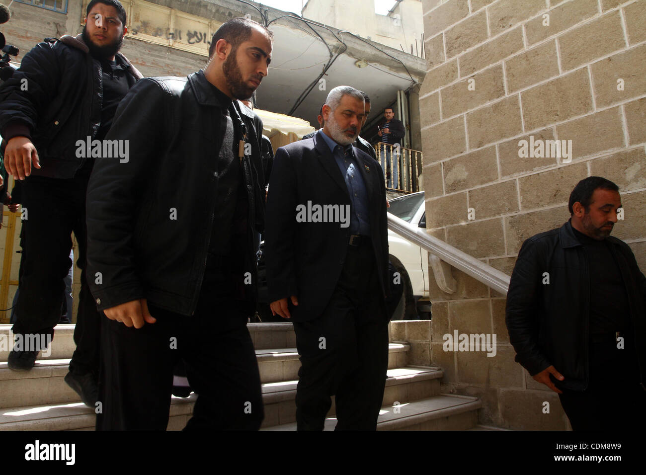 Palestinian Prime Minister of Hamas Ismail Haniyeh walks with ...