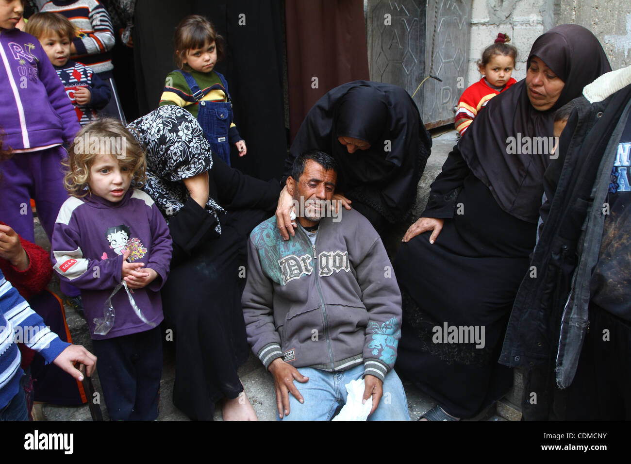 Relatives of Palestinian Mohammed Shalha react during his funeral in ...