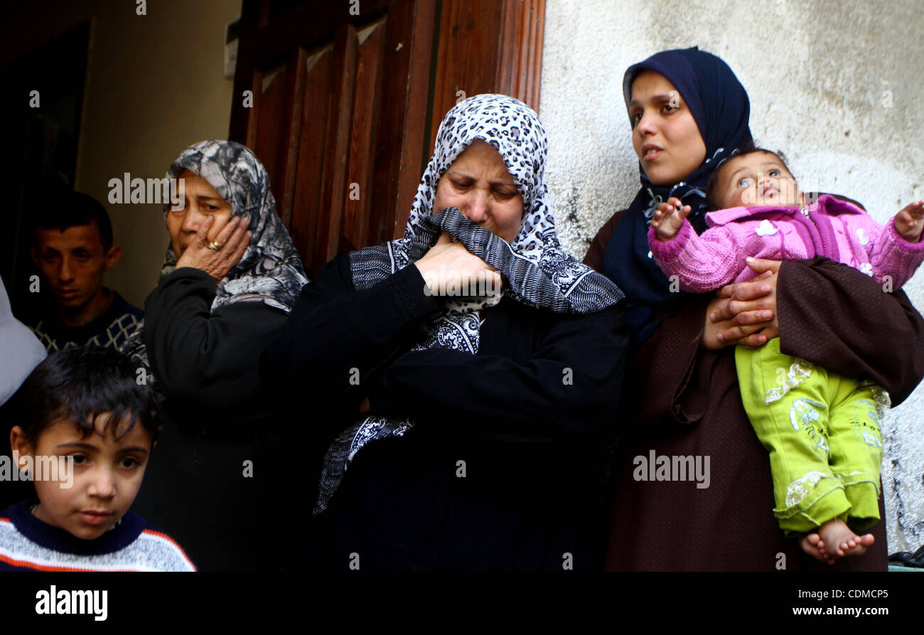 Relatives of Palestinian Mohammed Shalha react during his funeral in ...
