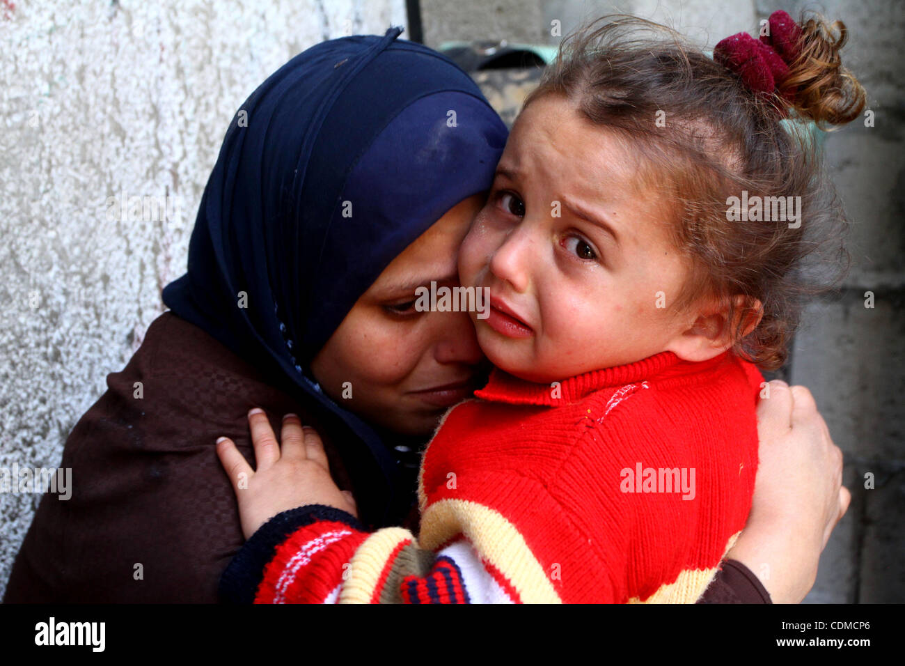 Relatives of Palestinian Mohammed Shalha react during his funeral in ...