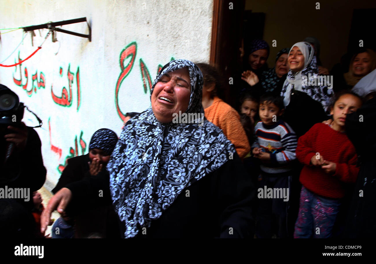 Relatives of Palestinian Mohammed Shalha react during his funeral in ...