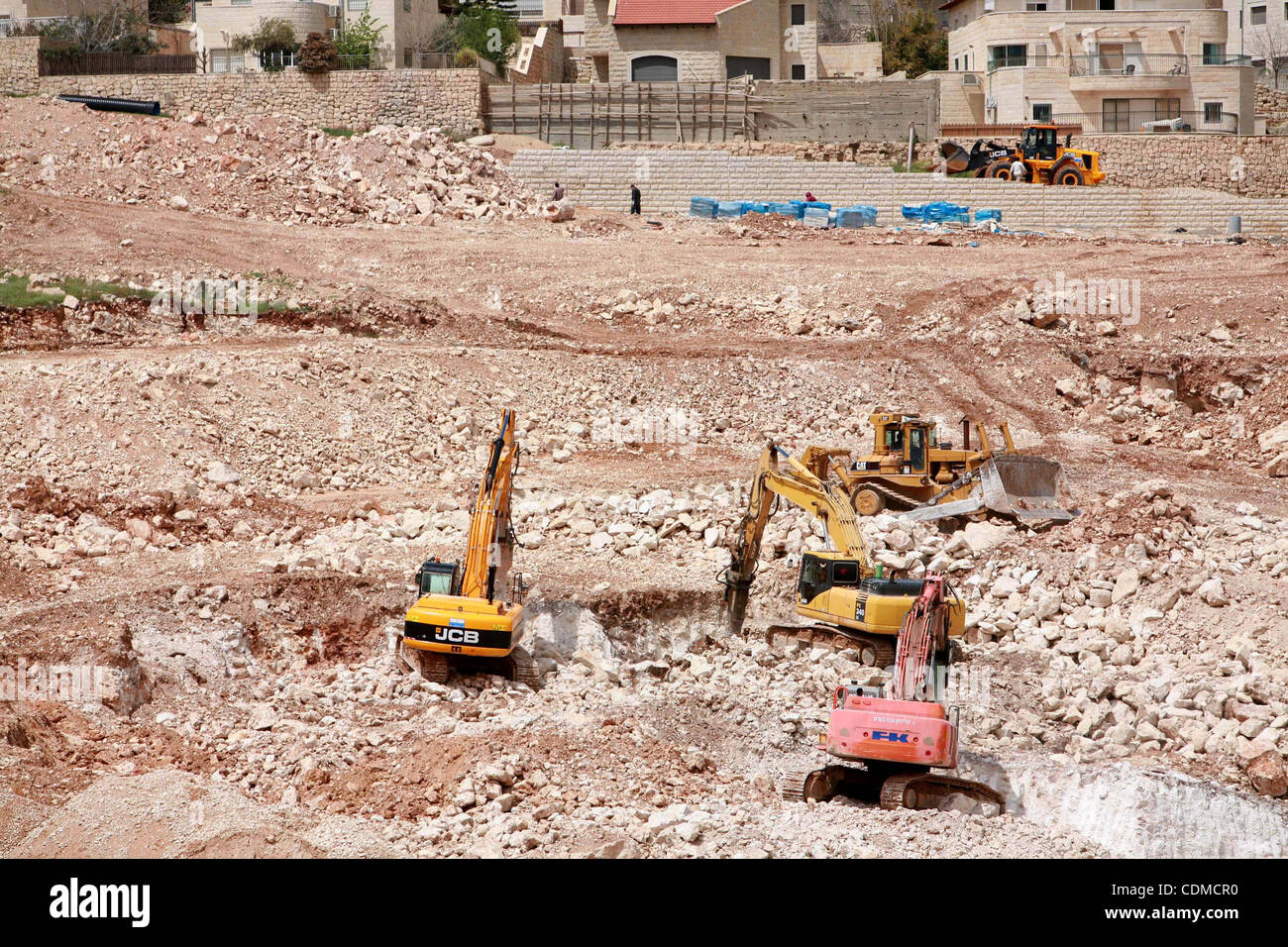 Israeli bulldozers work in the jewish settlement of Pisgat Zeev in East ...
