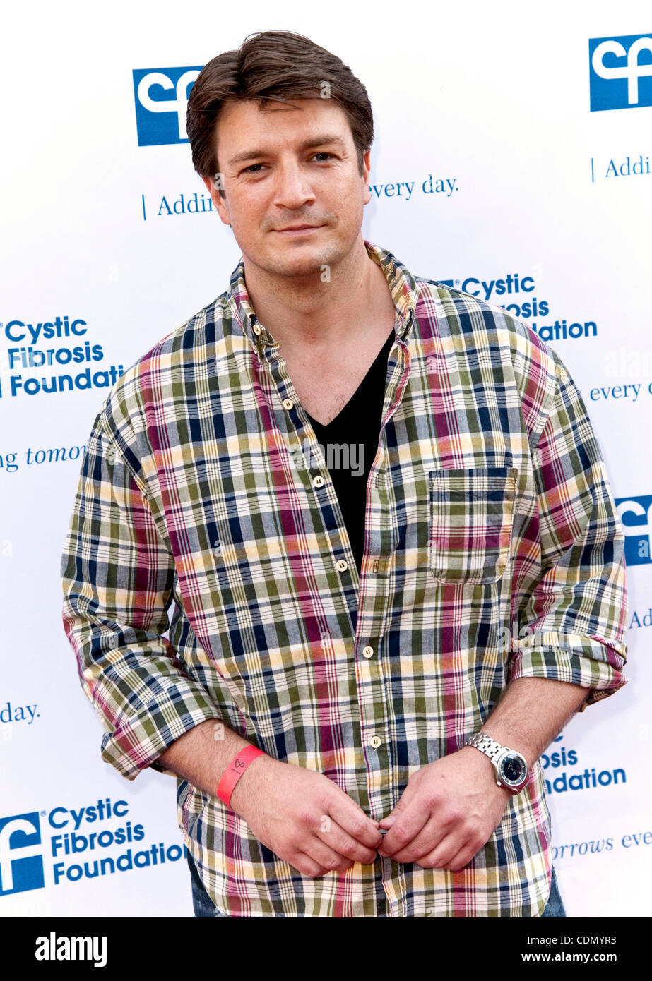 Apr.16, 2011 - Universal City, California, USA - NATHAN FILLION arrives ...