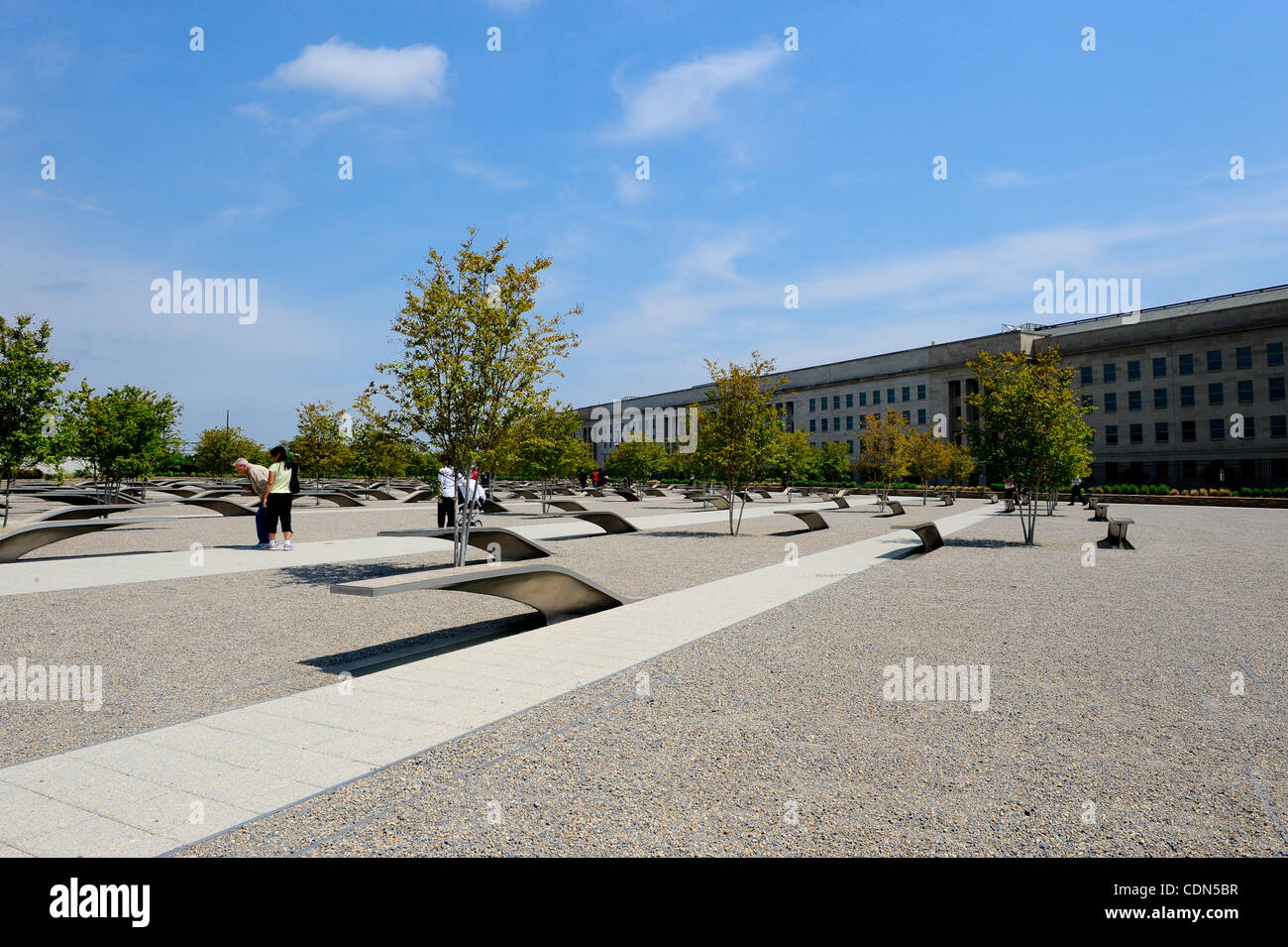 MAY 02: Visitors walk around the Pentagon Memorial at the Pentagon in ...