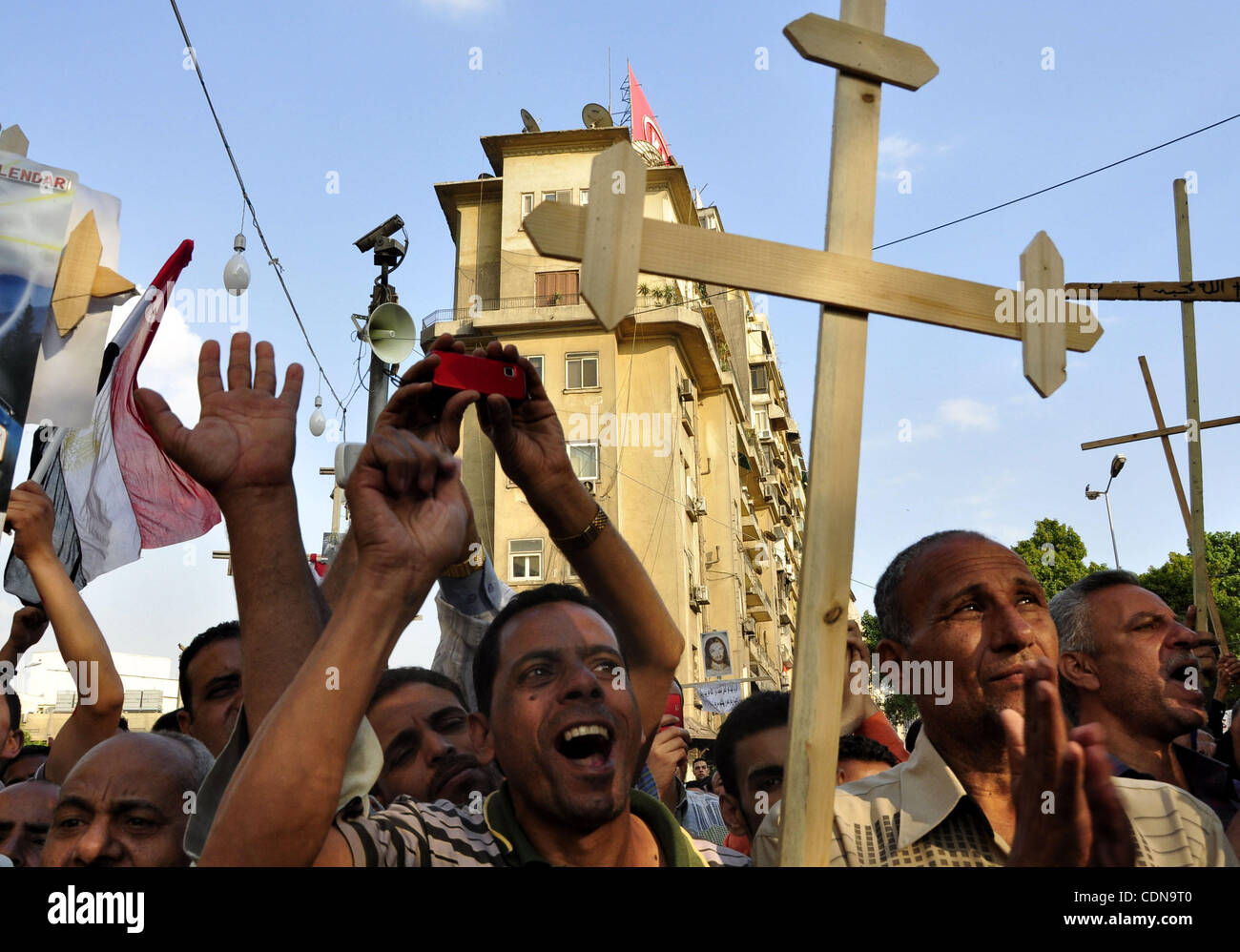 Egyptian Coptic Christians protest in front of the state television ...