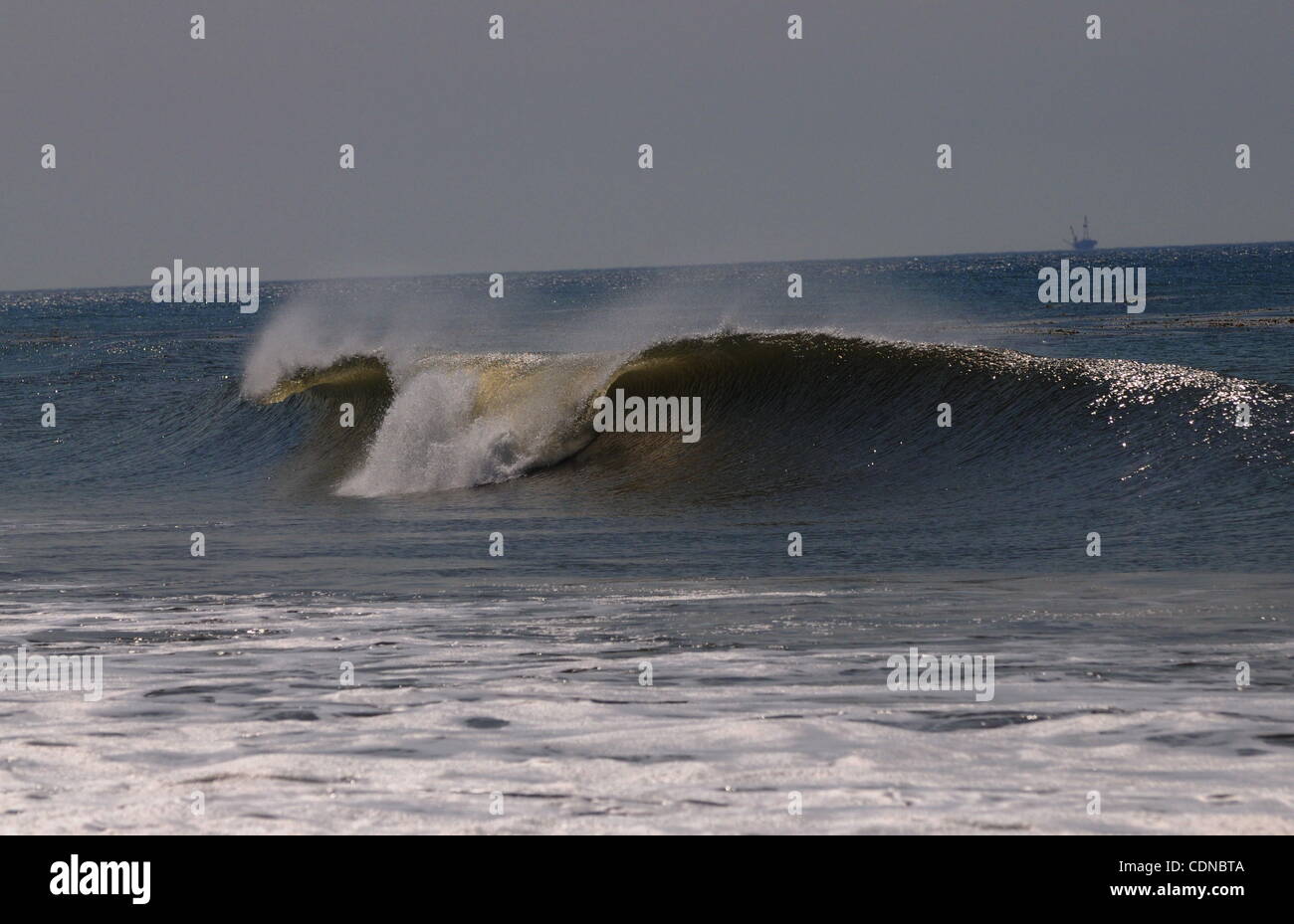 Waves break in the surf of the Pacific Ocean at Gaviota State Beach ...