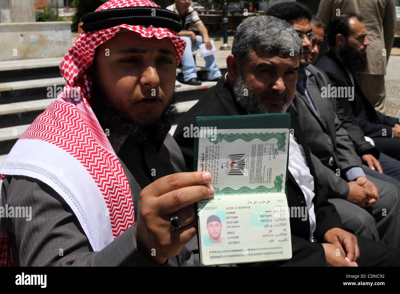 May 21, 2011 - Gaza City, Gaza Strip - Palestinian man holds his ...