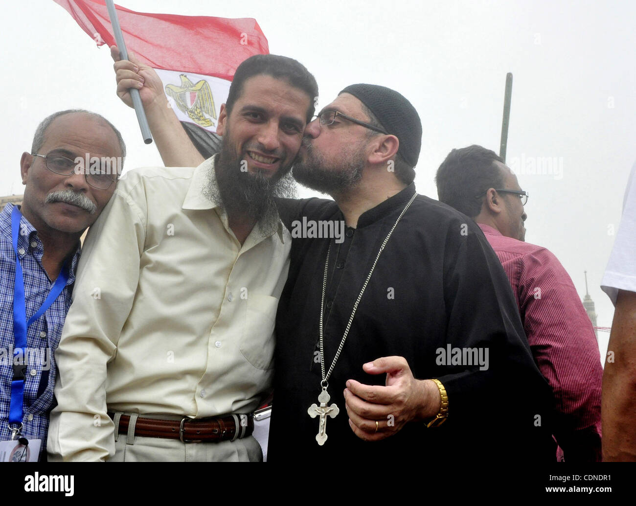 May 27, 2011 - Cairo, Egypt - An Egyptian Christian protester hugs a ...