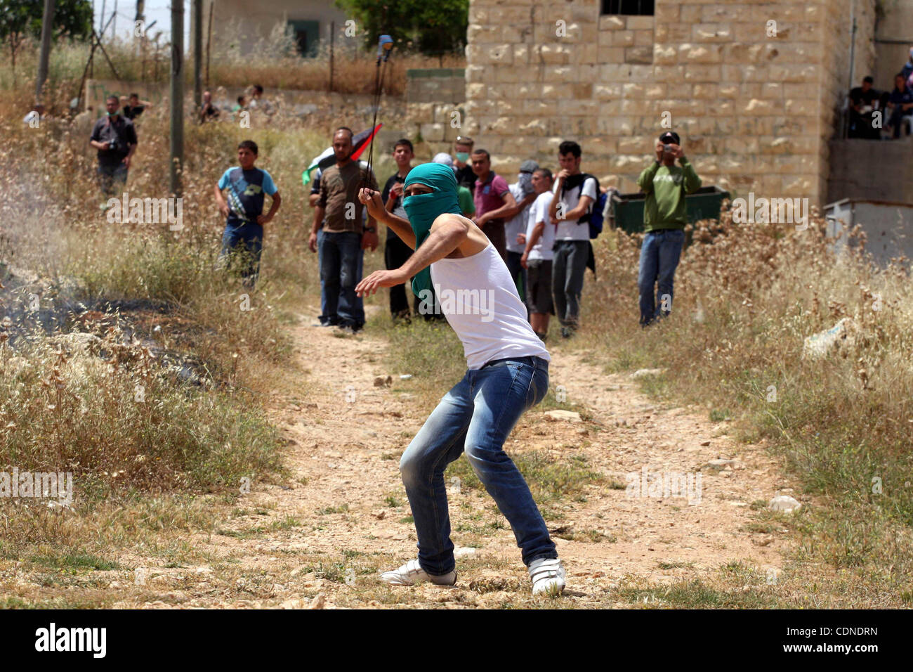 Palestinian with sling shot hi-res stock photography and images - Alamy