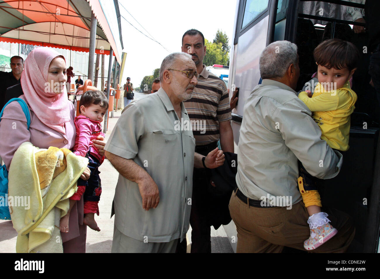 Palestinian boarding the bus to cross into Egypt through the Rafah ...