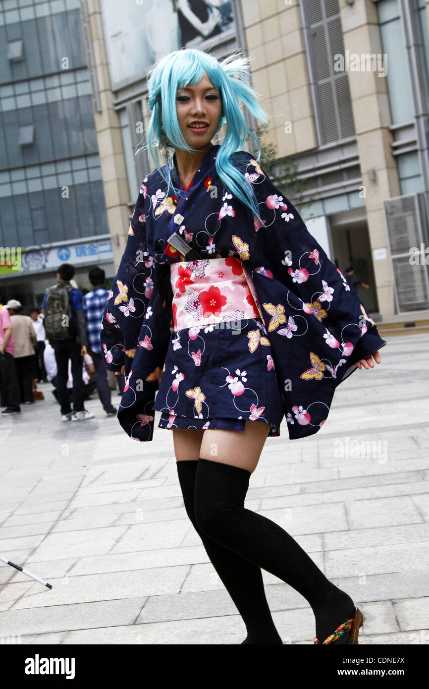 May 29, 2011 - Shanghai, China - A cosplayer practices a song and dance ...