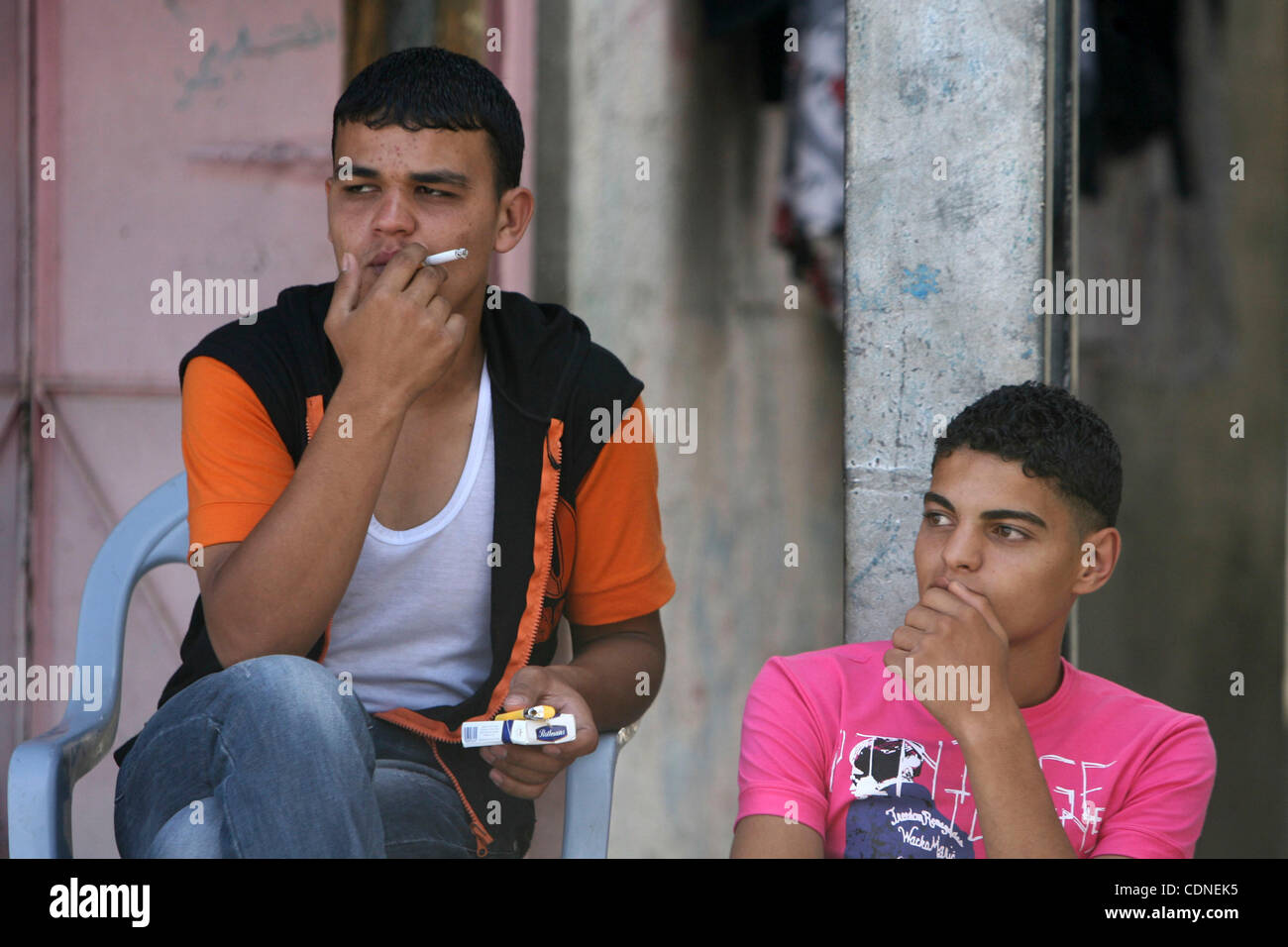 Palestinian man smokes cigarettes in Rafah, southern Gaza Strip on May ...