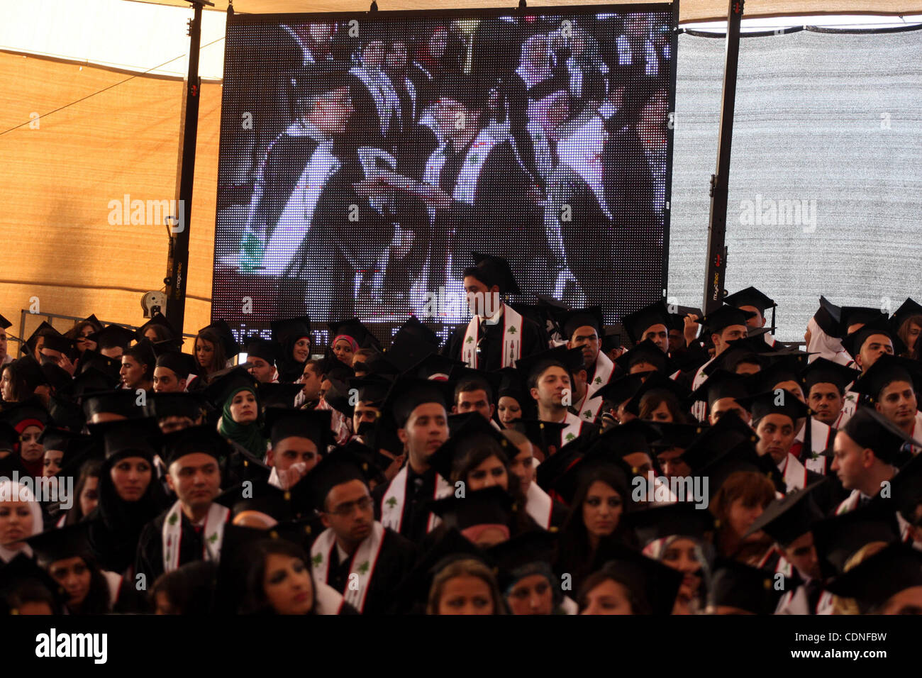 Palestinian students attend their graduation ceremony in Birzeit ...