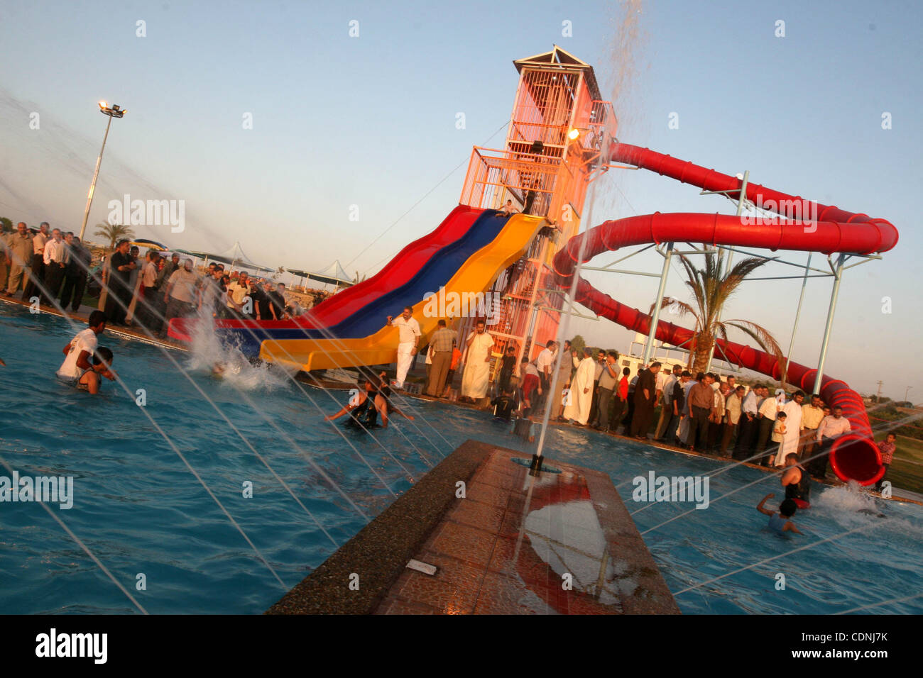 Palestinians enjoy swimming in a pool at the newly-opened "Asda City ...