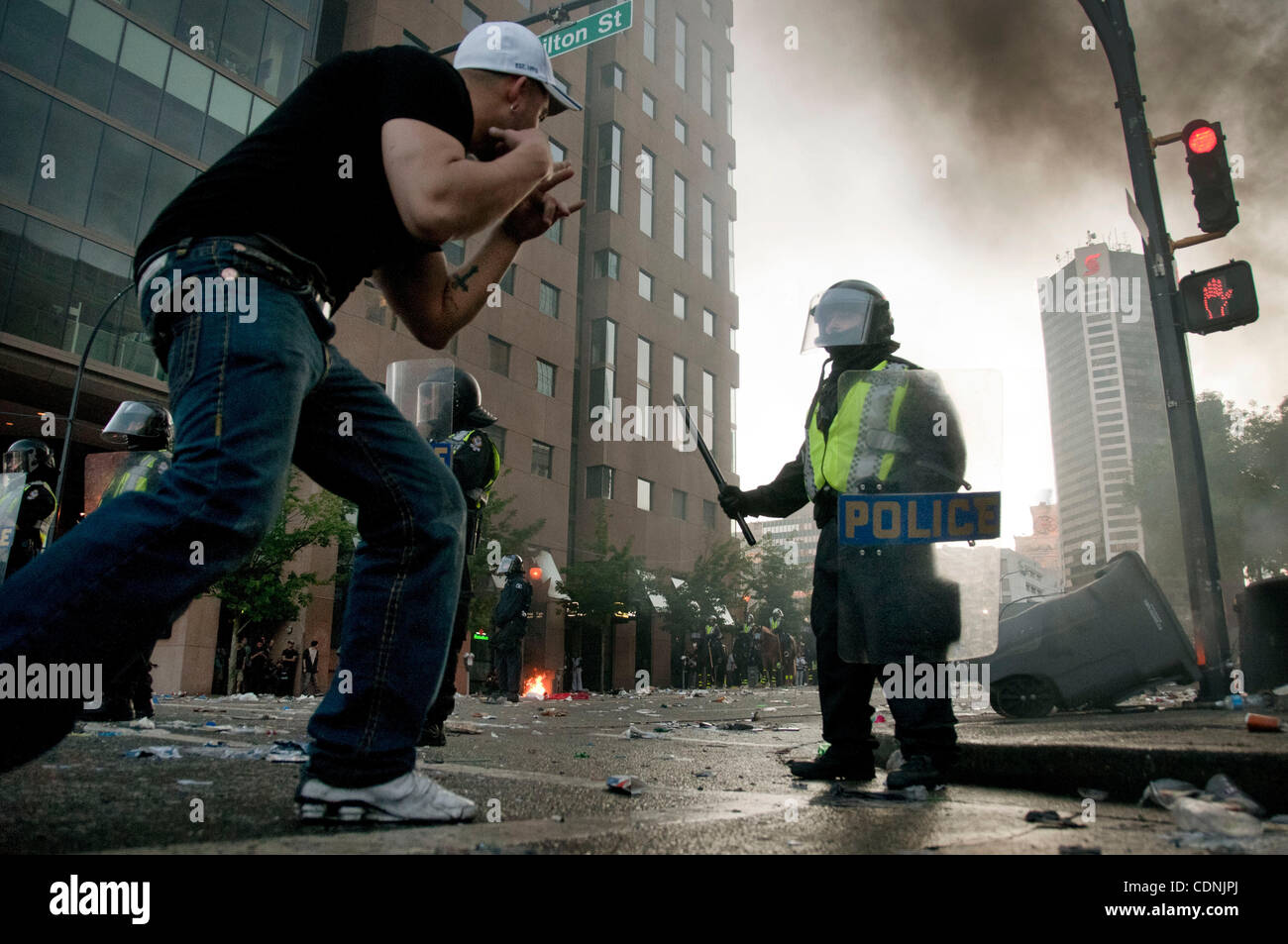 Canucks fan riot hi-res stock photography and images - Alamy