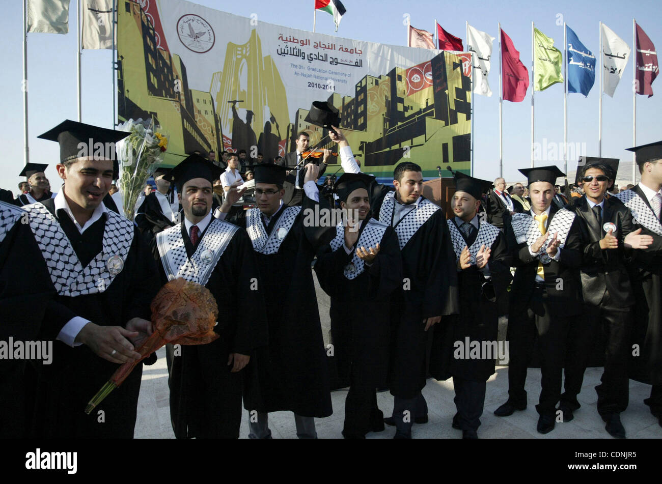 Palestinian students attend a graduation ceremony at the An Najah ...