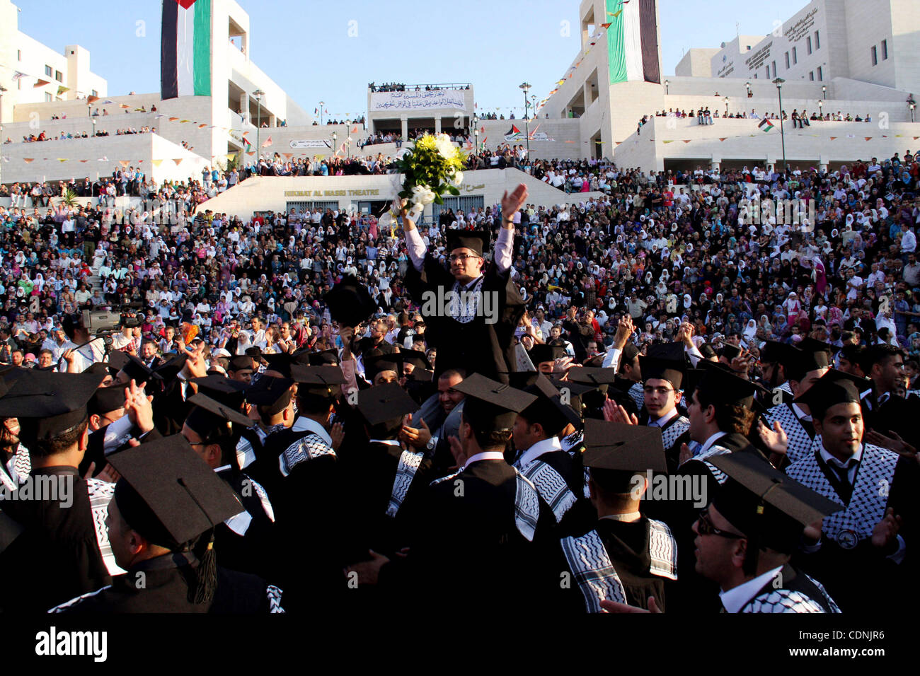 Palestinian students attend a graduation ceremony at the An Najah ...