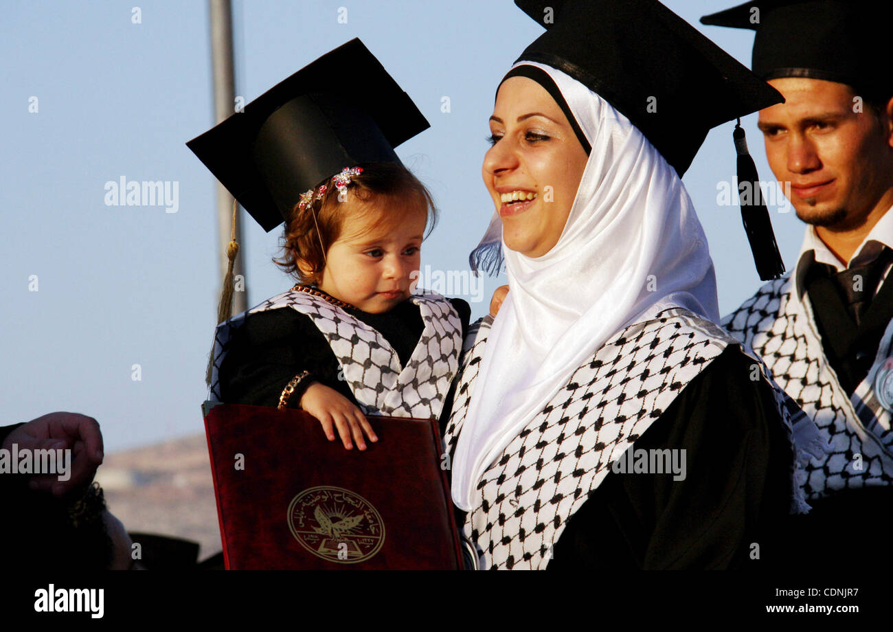 Palestinian students attend a graduation ceremony at the An Najah ...
