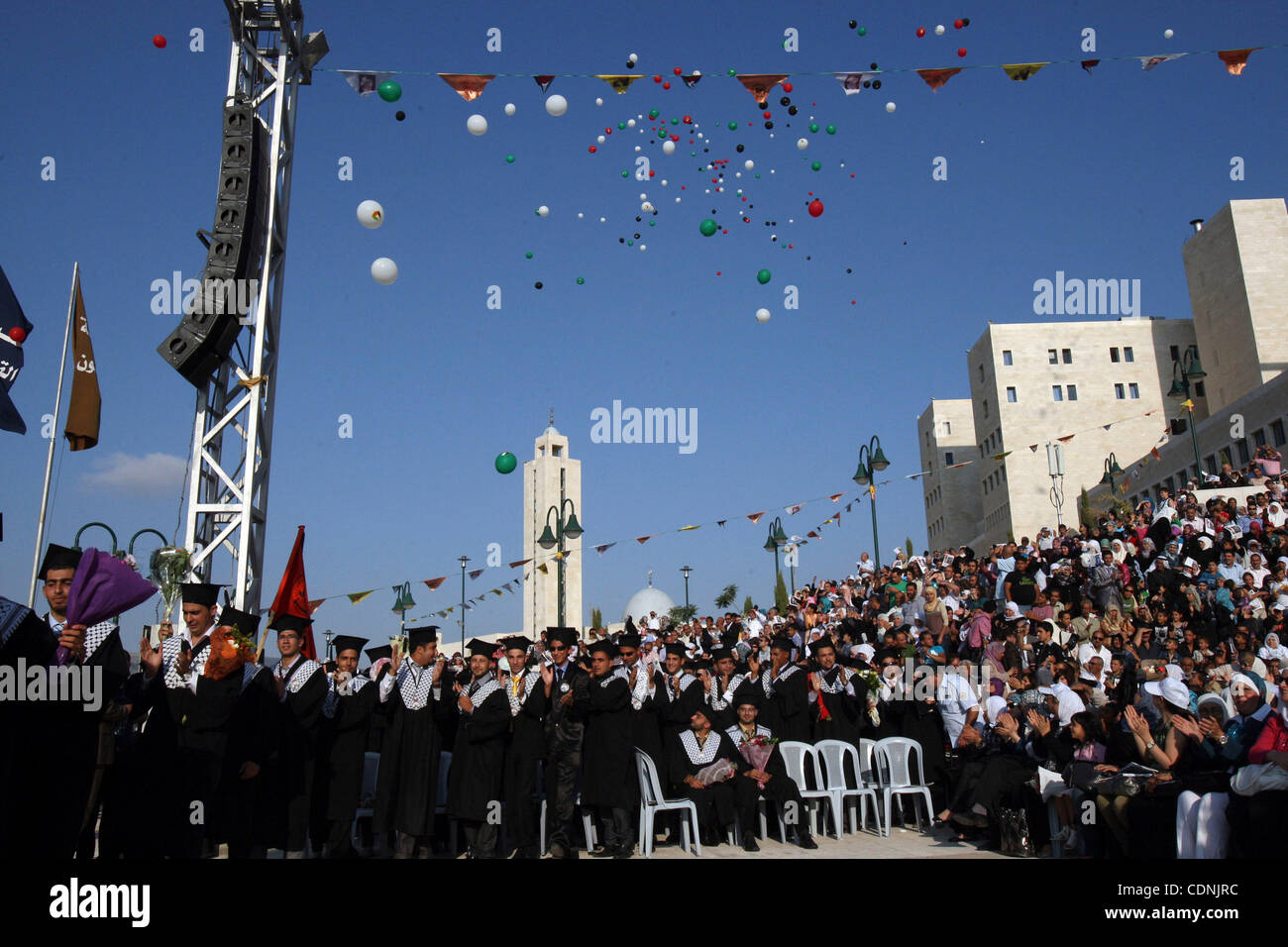 Palestinian students attend a graduation ceremony at the An Najah ...