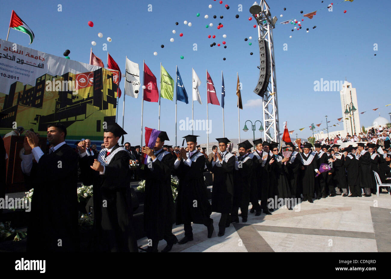 Palestinian students attend a graduation ceremony at the An Najah ...