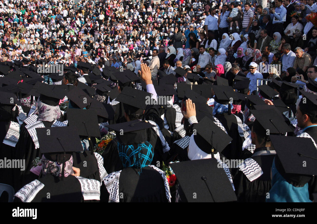 Palestinian students attend a graduation ceremony at the An Najah ...