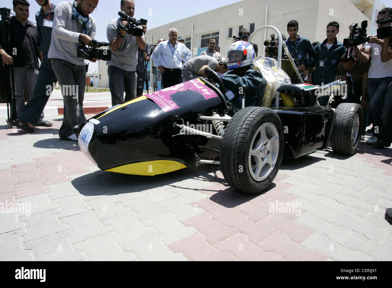 Palestinian students test their Formula 1-style racing car, made from ...