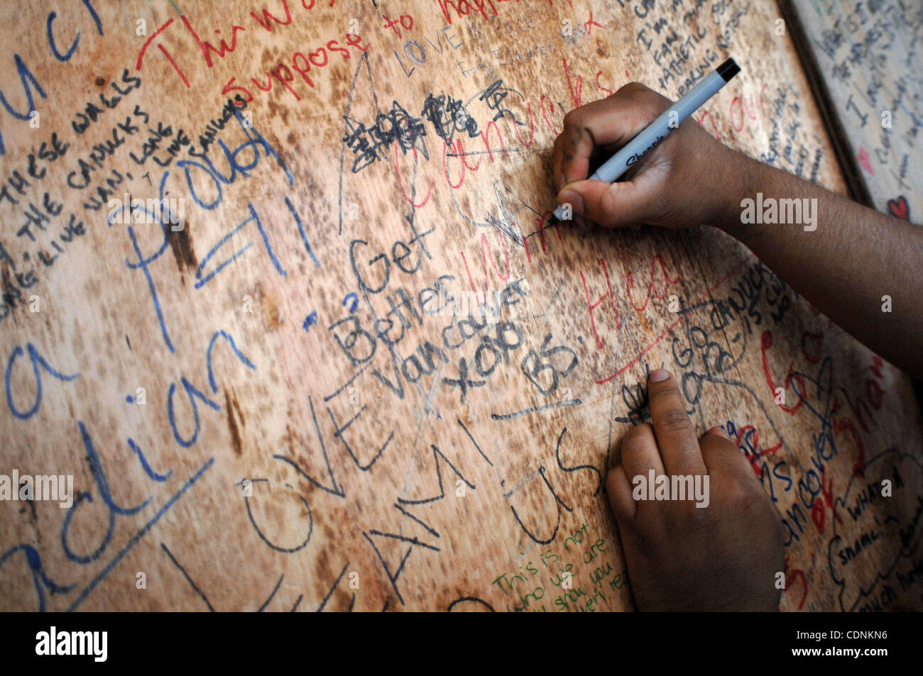 Jun 17, 2011 - Vancouver, British Columbia, Canada - A man writes a ...