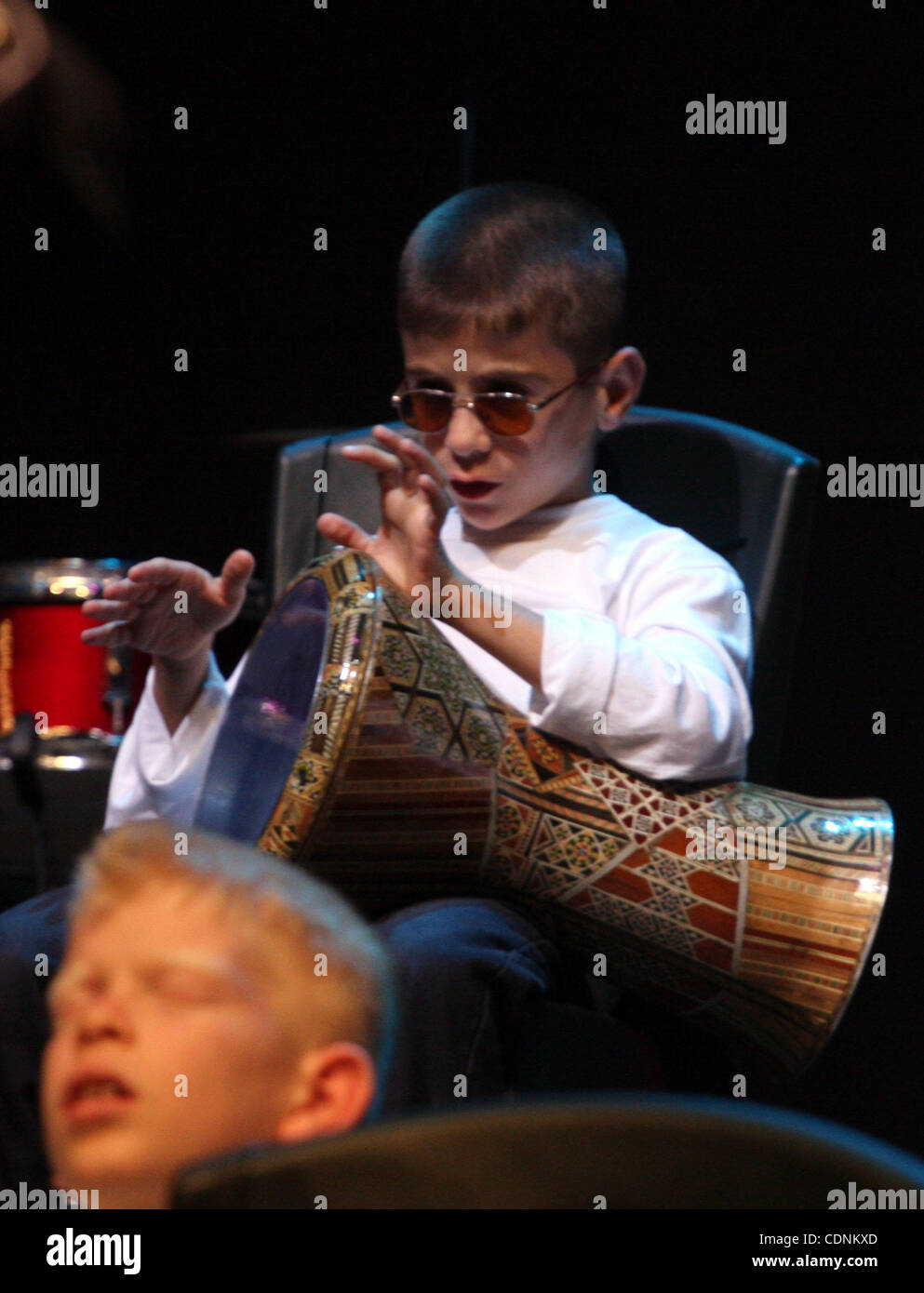 Blind Palestinian children sing and play on the musical instruments ...