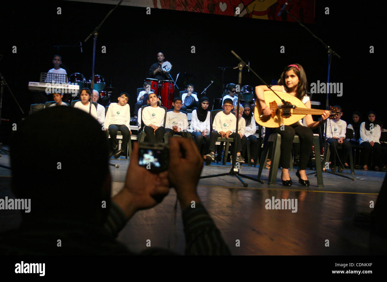 Blind Palestinian children sing and play on the musical instruments ...