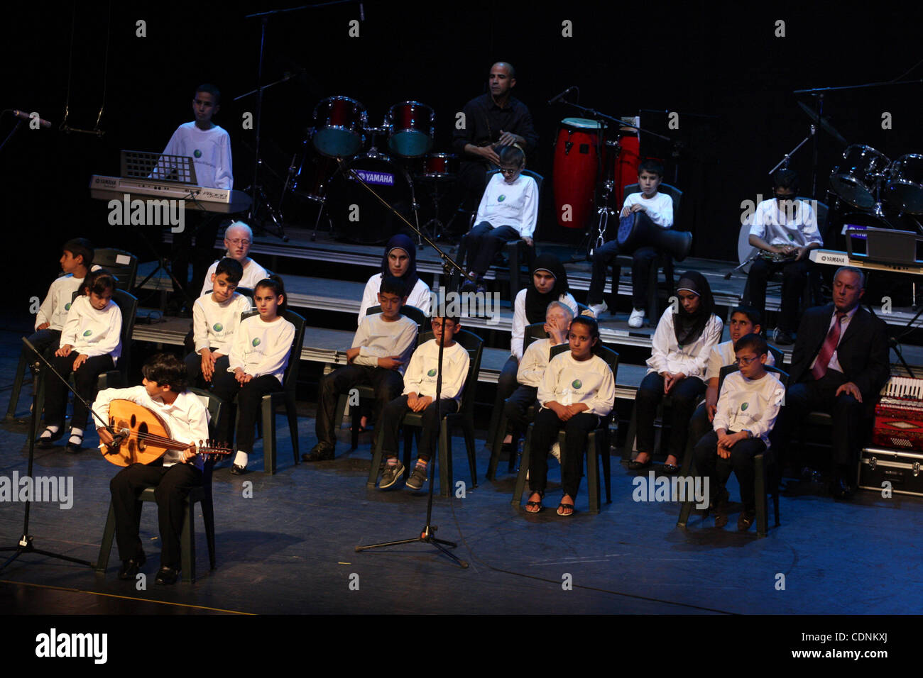 Blind Palestinian children sing and play on the musical instruments ...