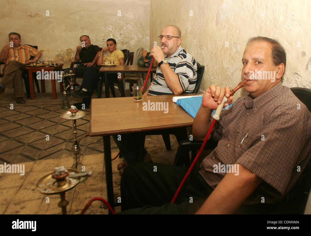 June 22, 2011 - Jerusalem, Gaza - Palestinian men smoke waterpipes or ...