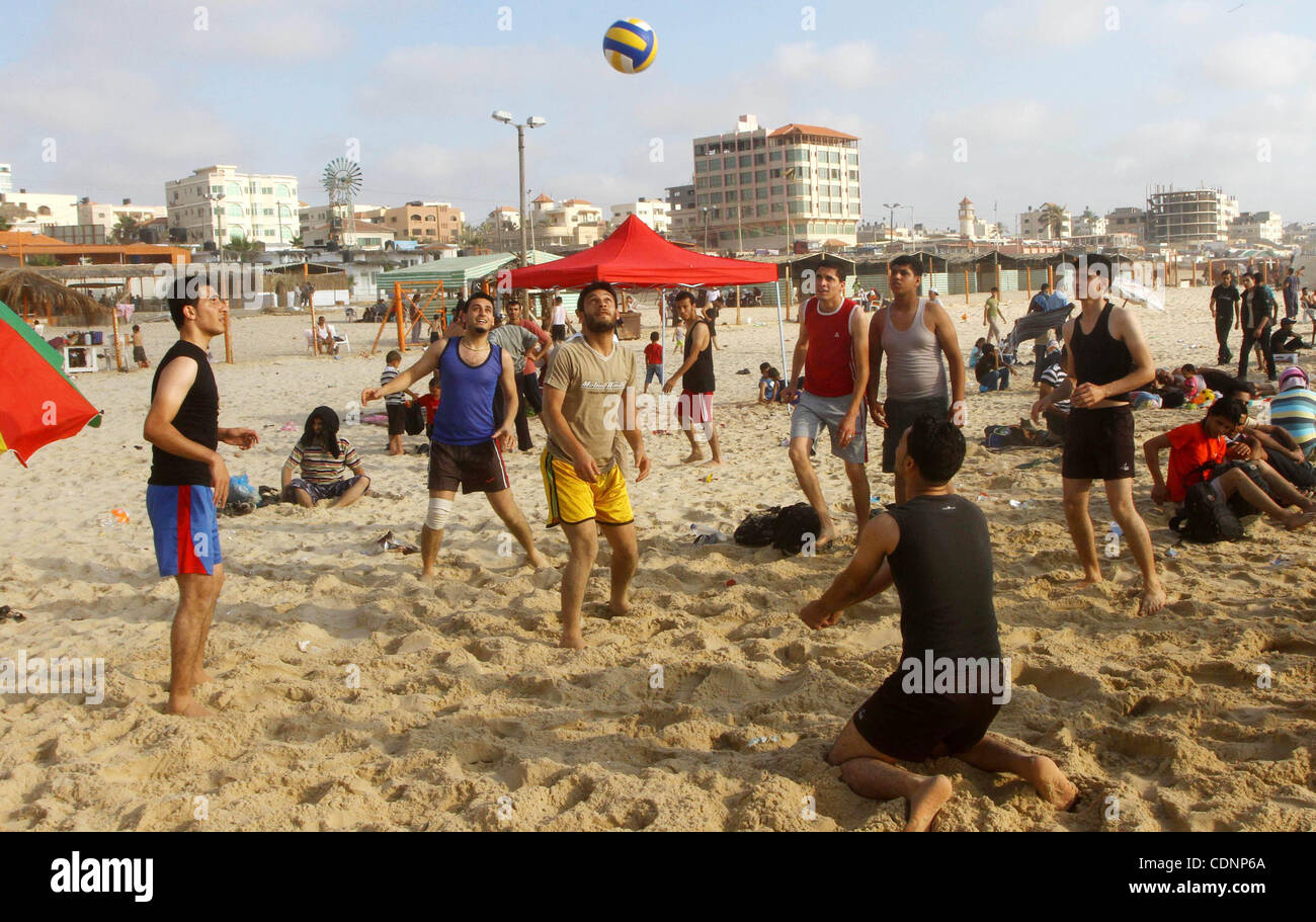 Palestinians enjoy a day at the beach in Gaza City on June 24, 2011 ...