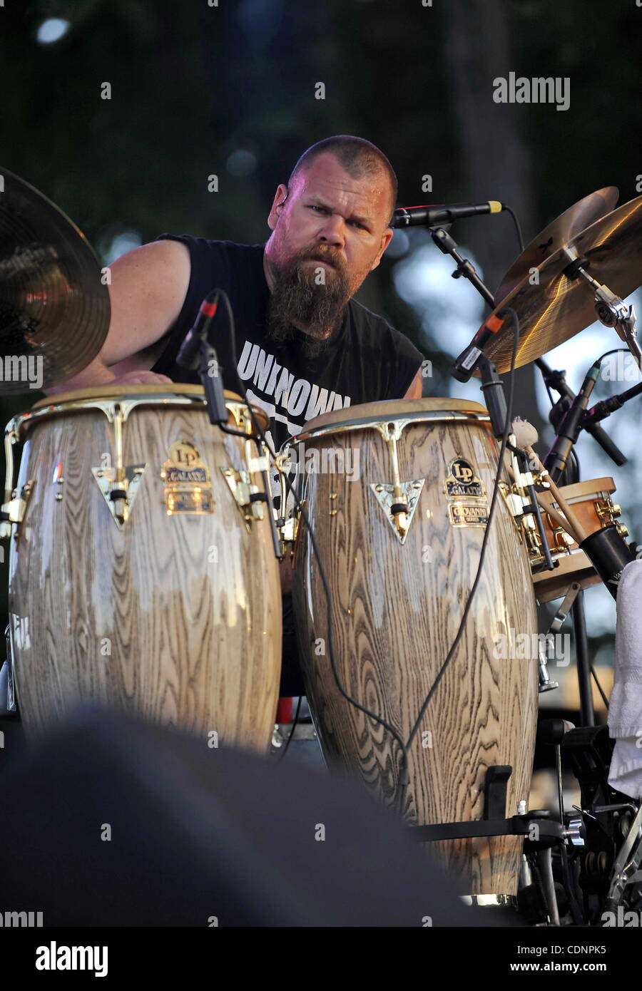 The bongo drummer performs with Jamey Johnson during his live concert ...