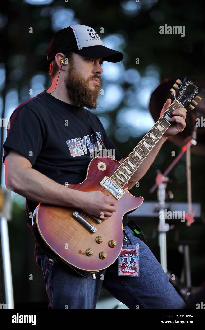 The lead guitarist performs with Jamey Johnson during his live concert ...
