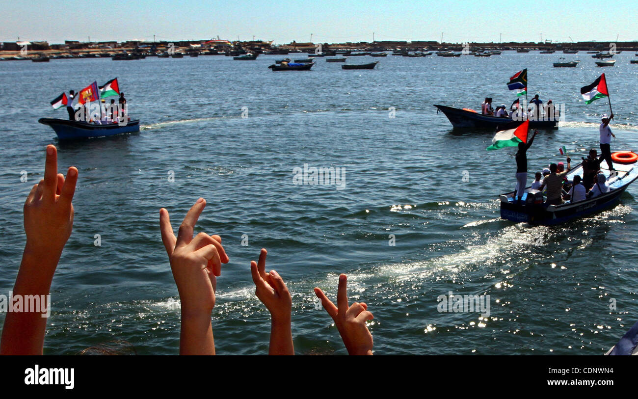 Palestinians ride on boats at the port of Gaza City during a rally in ...