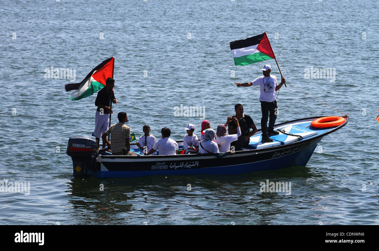 Palestinians ride on boats at the port of Gaza City during a rally in ...