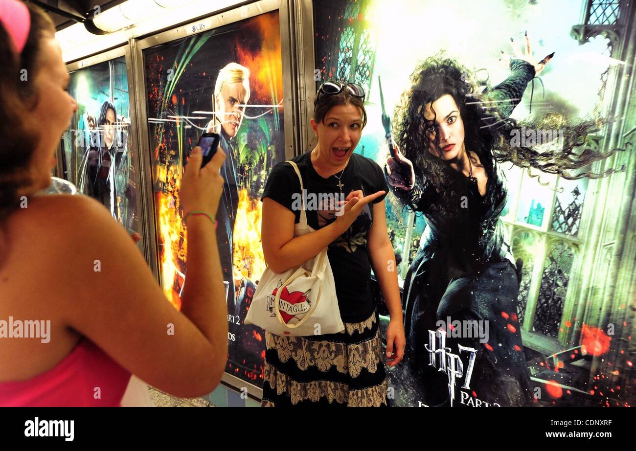 July 6, 2011 - Manhattan, New York, U.S. - Taylor Monfra takes a photo ...